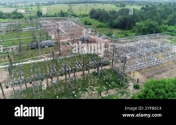 High voltage electrical substation. View from flying drone. Power plant ...