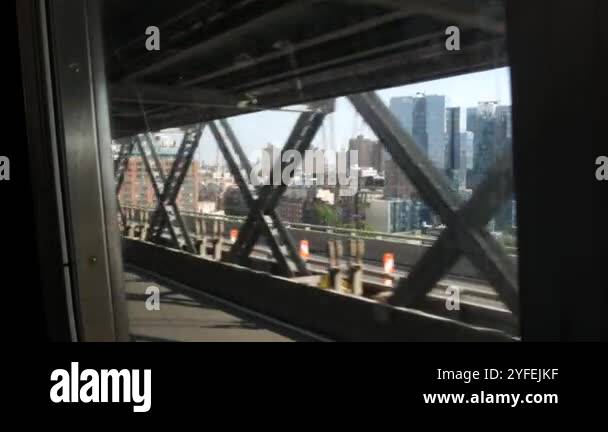 New York City subway train, Williamsburg bridge. Shaking camera thru dirty window. Manhattan ...