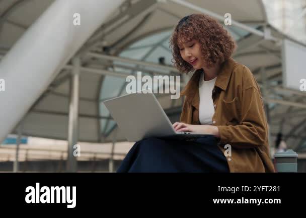 Happy Curly Young Asian Journalist Working Online While Sitting ...