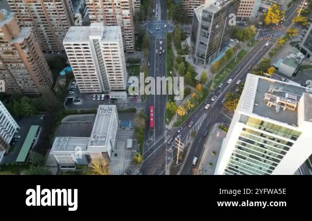 An elevated aerial view of an urban street surrounded by high-rise ...