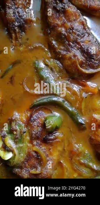 Delicious hot and spicy fish curry. Traditional dish made with fish ...