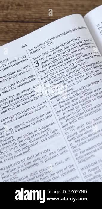 Studying open holy bible book. Vertical video. Top view. Christian ...