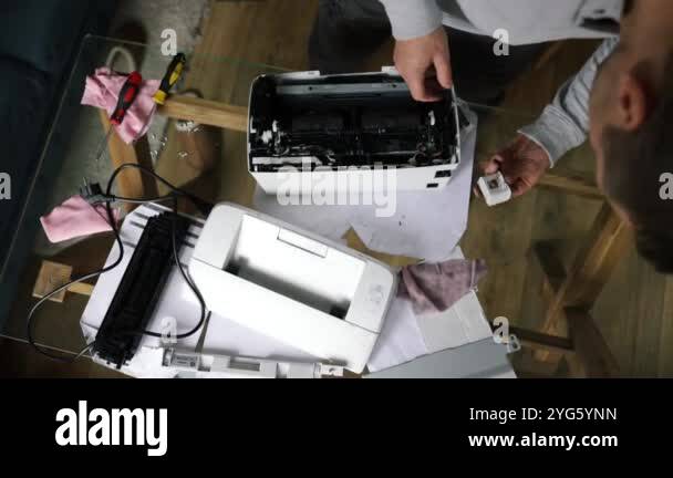 Printer repairman inspecting printer interior. Concept of professional ...