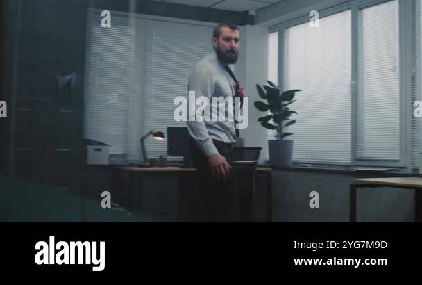 Aggressive businessman loses his temper in a fit of rage. Furious and ...