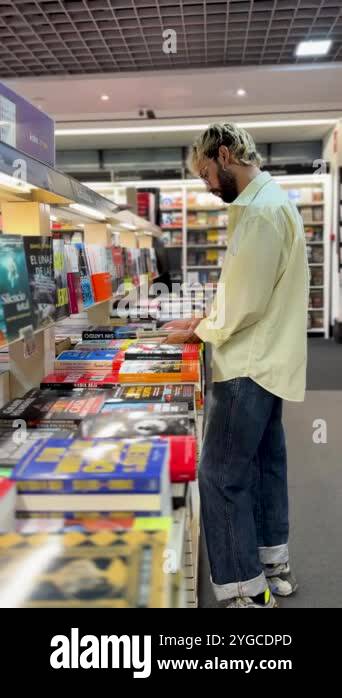 Browsing through books Stock Videos & Footage - HD and 4K Video Clips ...