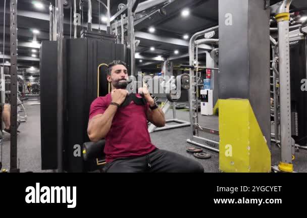 Man Performing Lat Pulldown for Back Muscle Strength in Gym,Training ...