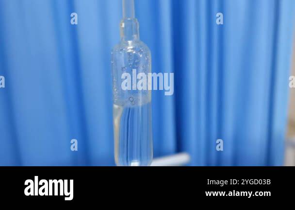 iv drip drops into the patient's room Closeup Saline solution or NSS ...