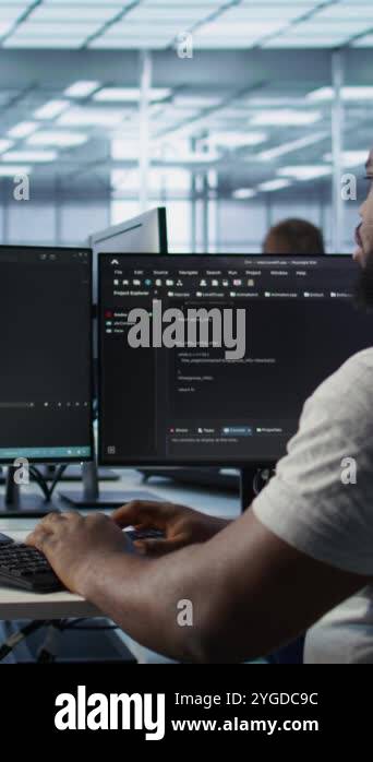 Admin in server hub tasked with protecting valuable data against hacking attack on computers ...