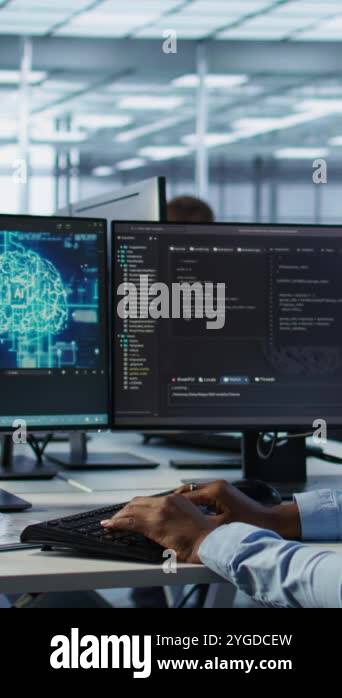 Woman leaving desk after finishing programming tasks in AI data center used for machine learning ...