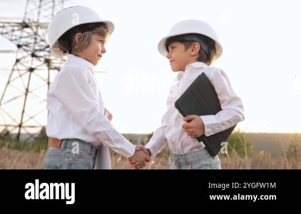 Little kids shaking hands. Handshake, welcome to team, introduction or ...