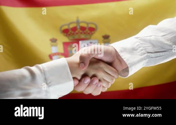 Spanish Man And Woman Business Partners Shaking Hands. Handshake, Make ...