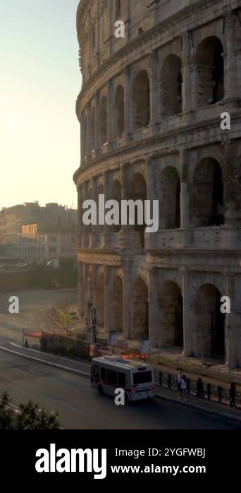 Rome Colosseum and crowded street of Rome , Italy . The Colosseum was ...