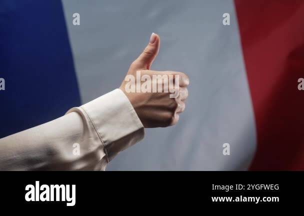 Woman Makes Hand Sign Like, Thumb Up Gesture on french flag background ...