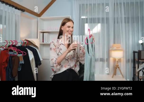 Two women influencer shoot live streaming vlog video review clothes ...