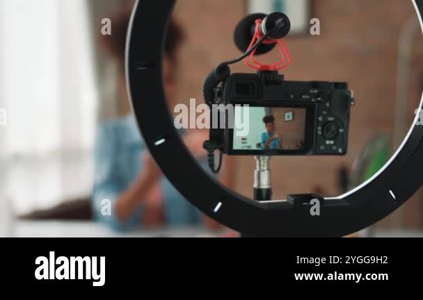 Rear view camera screen recording woman influencer shoot live streaming ...