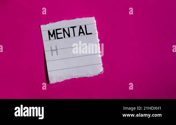 Mental health matters message writing on ripped torn paper piece on pink background. Conceptual ...