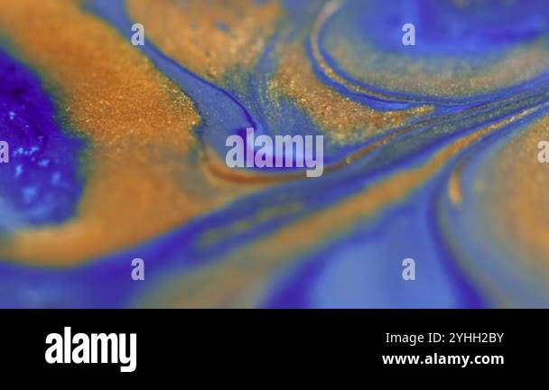 Sparkling ink wave. Paint spill. Defocused blue golden color shimmering ...