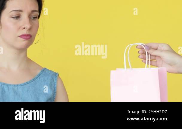 Disappointing gift. Gesture refusal. Woman rejecting unwanted presents ...