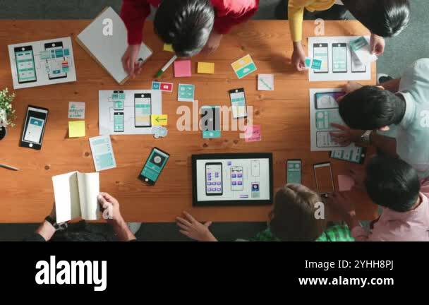 Top view of smart software developer planning software development. Skilled programmer team ...