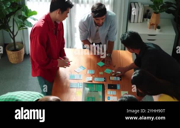 Front End Developer Team Brainstorming About Ux And Ui Design For Mobile App While Designing