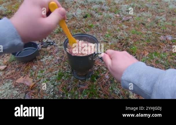 Camp Food. Cooking in a Forest Using a Small Cook Set - First Person ...