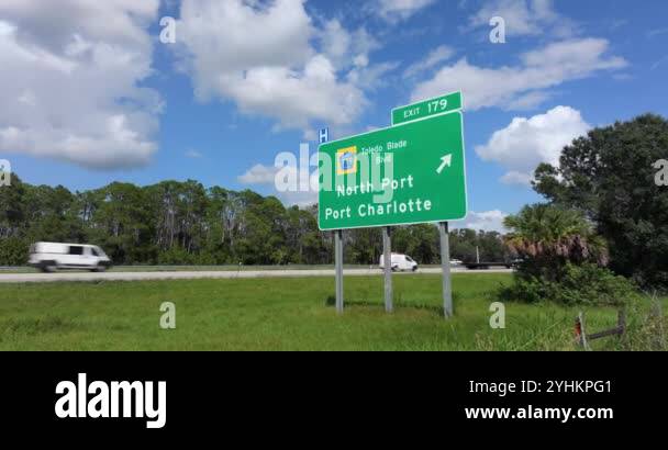 Interchange with road sign Stock Videos & Footage - HD and 4K Video ...