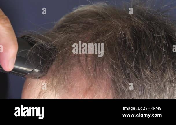 Shaving off hair on head Stock Videos & Footage - HD and 4K Video Clips ...