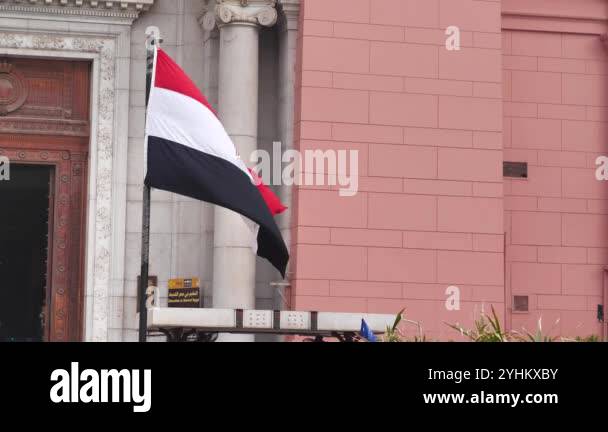 National flag of Egypt outside the Egyptian Museum in Cairo, Egypt ...