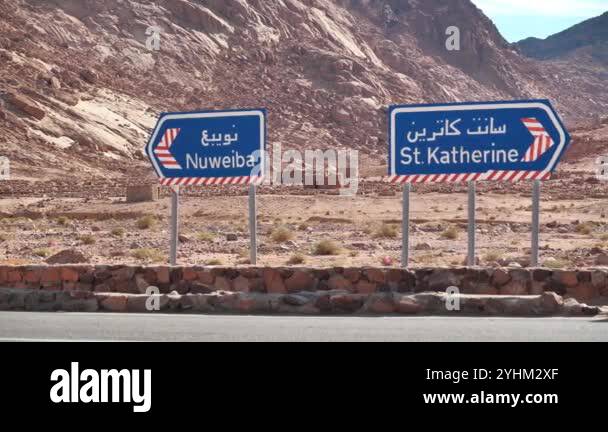 Ancient buildings and road signs near Saint Catherines Monastery in ...