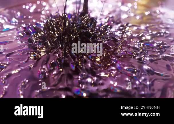 Real ferromagnetic fluid in action. Ferromagnetic fluid. Viscous ...