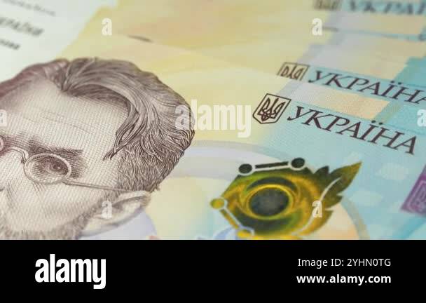 Security signs and elements on banknotes 1000 Hryvnia. Ukrainian paper ...
