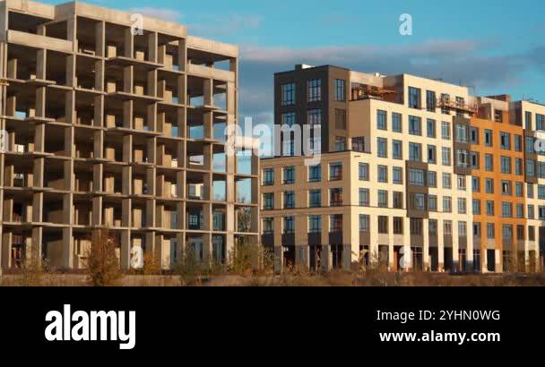 Frame of unfinished concrete construction of dwelling house near almost ...