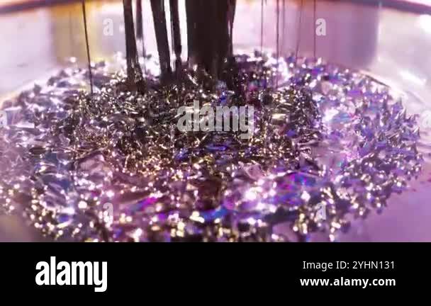 Ferromagnetic fluid. Real ferromagnetic fluid in action. Viscous ...