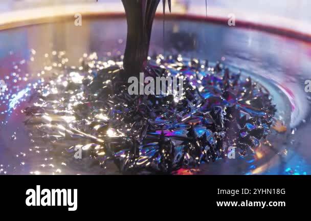 Ferromagnetic fluid. Viscous ferrofluid spike-like shape. Ferromagnetic ...