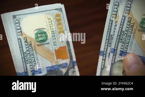 Hands holds American dollars. Cash counting. Converting cash American ...
