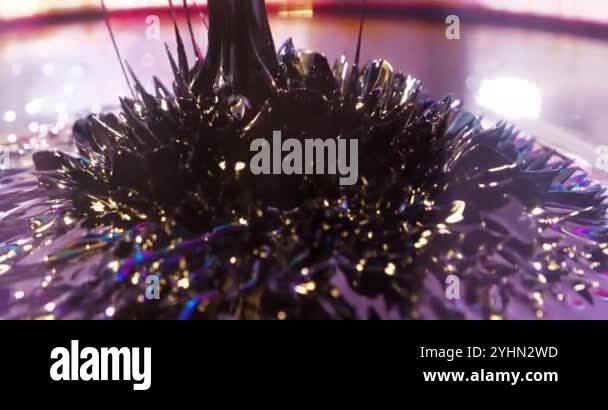 Ferromagnetic fluid. Real ferromagnetic fluid in action. Viscous ...