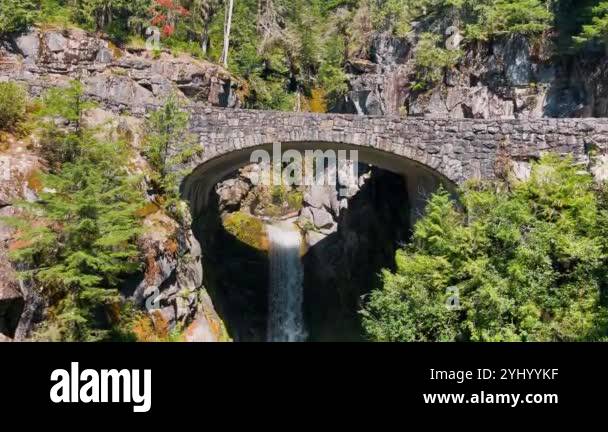 Mount Rainier National Park Stone bridge over a waterfall in a forest ...