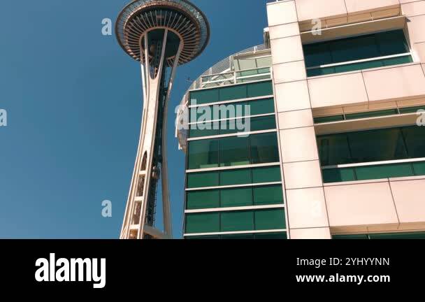 Seattle Washington 10.09.2024 Space Needle towering over modern glass ...