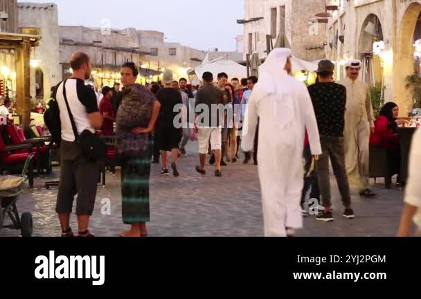 QATAR, DOHA, MARCH 22, 2018: People at Souq Waqif or the standing ...