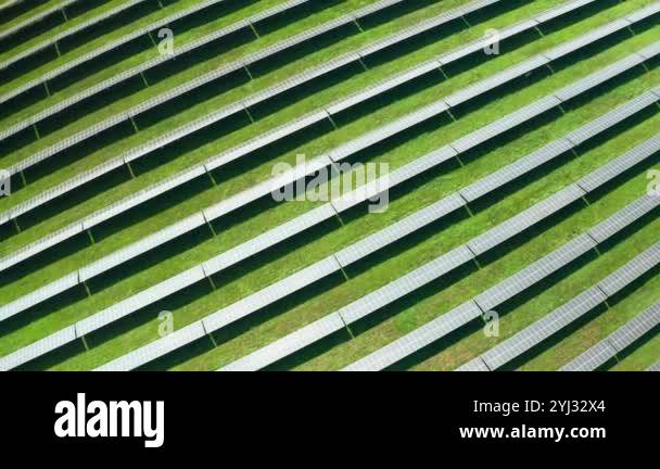 Modern solar panels installed in straight lines capture sunlight ...