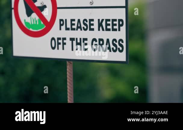Warning sign walk on grass Stock Videos & Footage - HD and 4K Video ...
