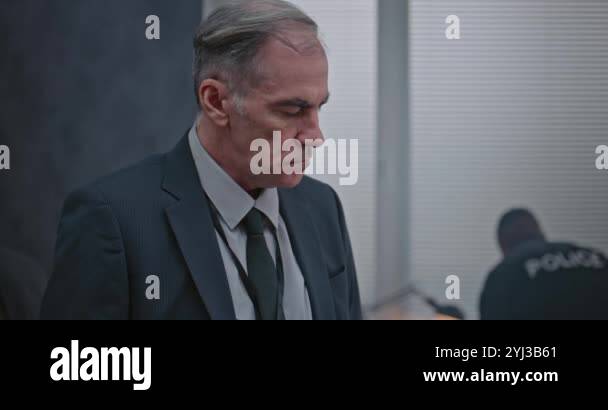 Office robbery or murder case: Crime investigation team working. Male ...