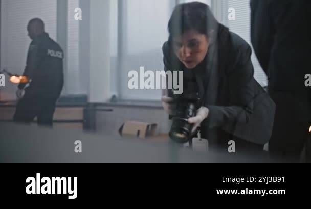 Office robbery or murder case: Female criminalist takes photos of ...