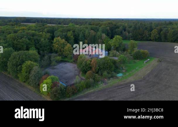 Traditional north german farm is nestled in the forest, photographed ...
