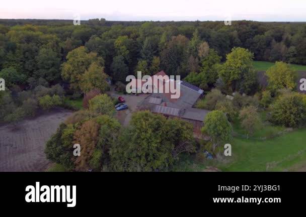 Traditional north german farm is nestled in the forest, photographed ...