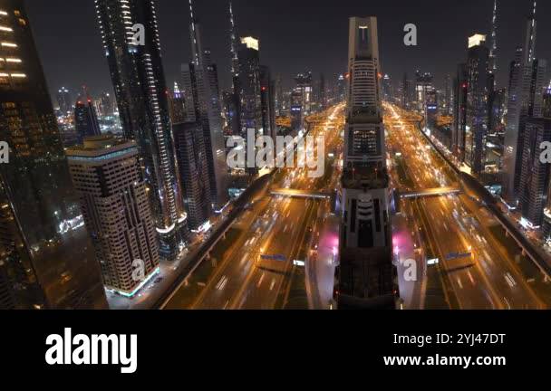 A breathtaking urban skyline at night with modern skyscrapers and ...