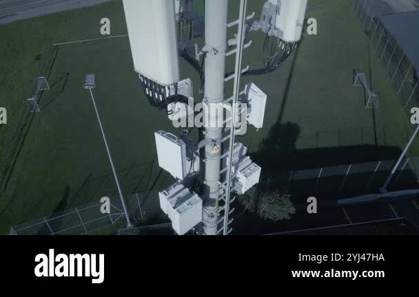 An aerial view shows a modern telecom tower with advanced technology ...