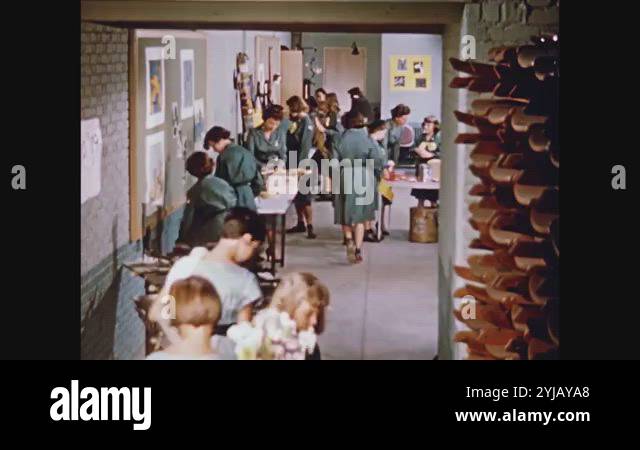 1956 - An integrated Girl Scout troop puts up a display of their own ...