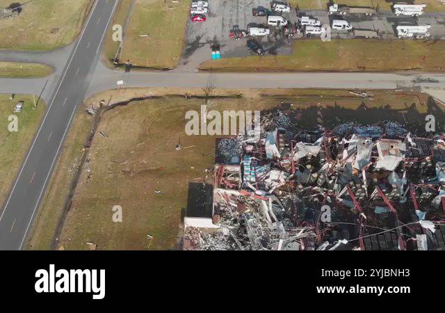 2021 - aerial of tornado damage and the shocking destruction of a factory in the town of Dawson ...