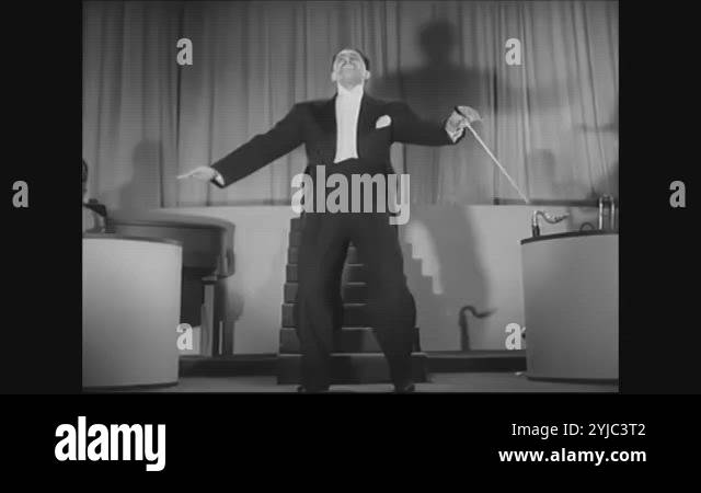 USA - 1943 - Cab Calloway finishes singing ""Jumpin' Jive"" at a ...